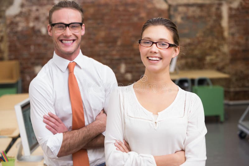 Two Smiling Business Colleagues in Office Stock Photo - Image of ... Two Smiling Business Colleagues in Office Stock Photo - Image of ...