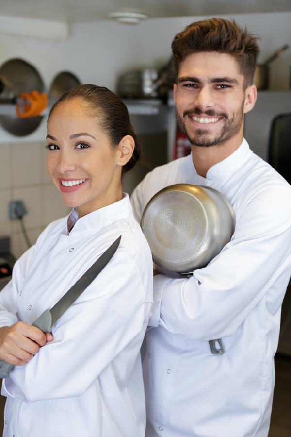 Two Smiling Chefs in Kitchen Stock Photo - Image of ingredient ...