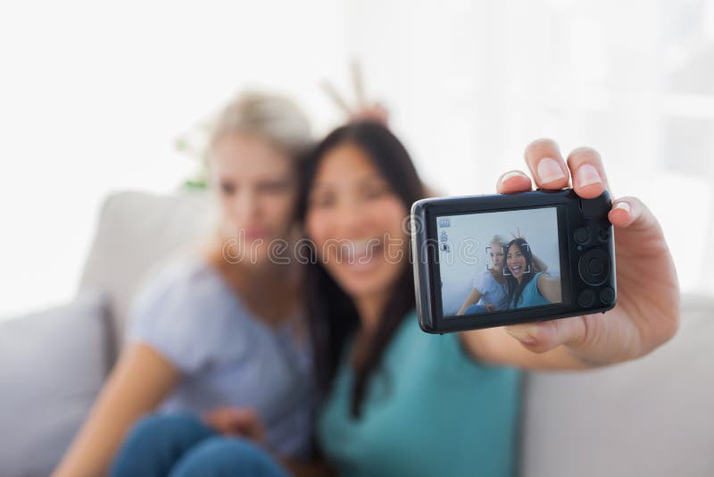 Two Smiling Friends Taking Photo with Camera Stock Photo - Image of ...