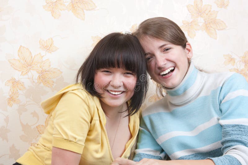Two smiling girls stock photo. Image of indoors, relaxation - 11848396
