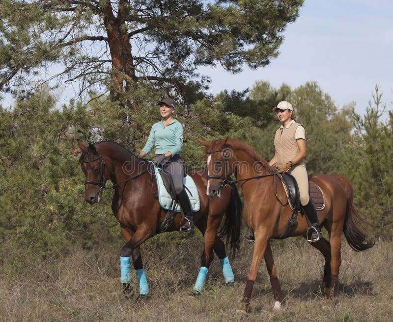 Two Smiling Girls Horseback Rides . Stock Image - Image of ground ...