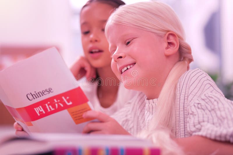 Two Smiling Girls Learning Chinese at School. Stock Image - Image of ...