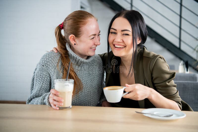 Two Smiling Students Having a Cup of Coffee in College Canteen Stock ...