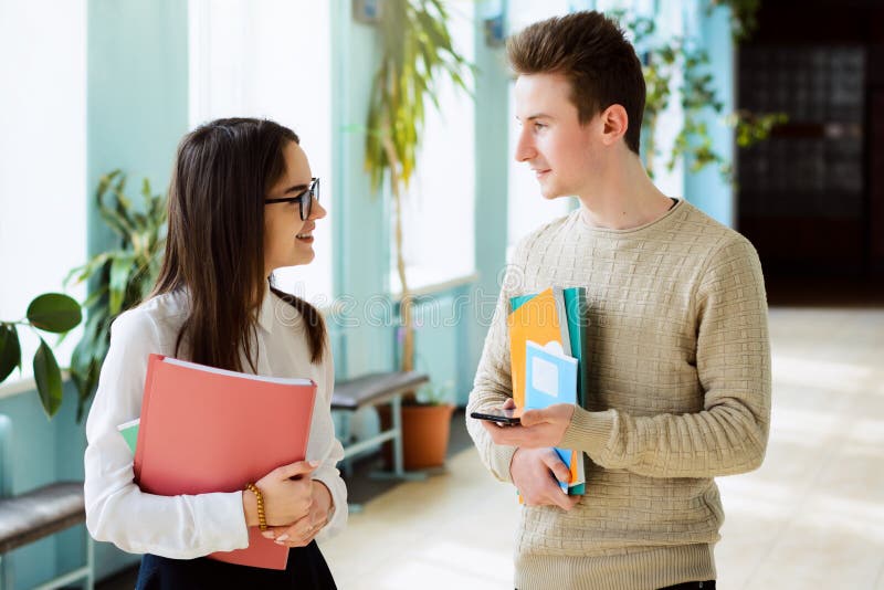 Two Smiling Students Communicate during the Break Stock Image - Image ...