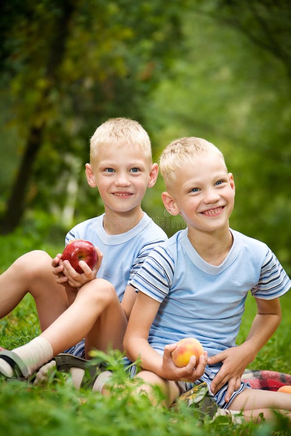 Two Smiling Twin Brothers Portrait Stock Photo - Image of outdoors ...