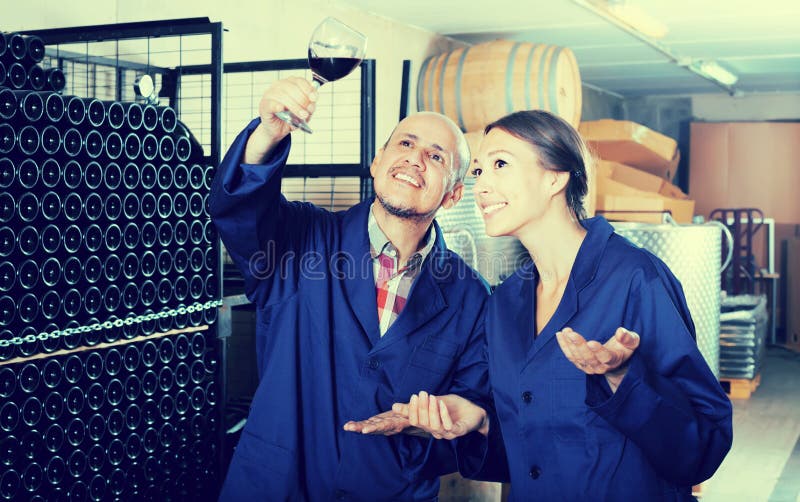 Two Smiling Winery Workers Different Ages in Aging Section of Fa Stock ...