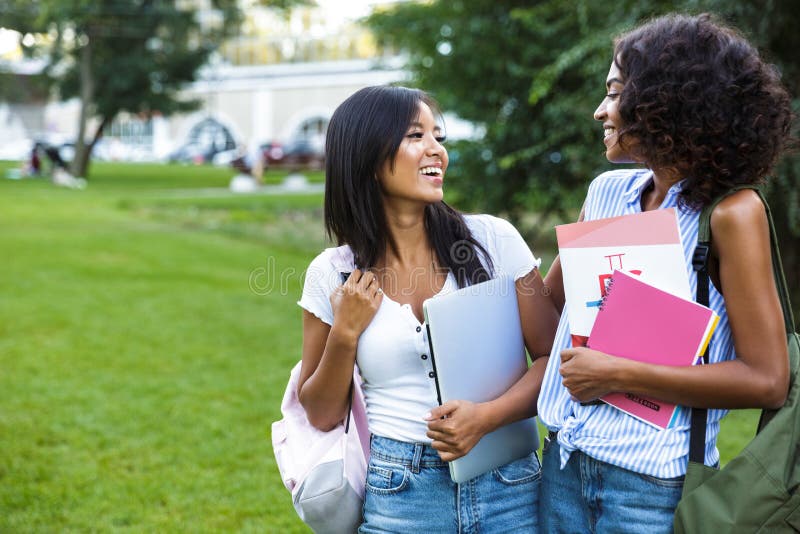 Two Smiling Young Girls Students Standing Outdoors Stock Image - Image ...