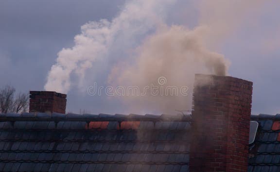 Two smoking chimneys stock photo. Image of dusk, closeup - 215080314