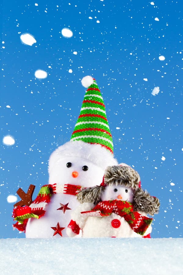 Two Snowmen Standing in the Snow Stock Photo - Image of holiday, snow ...