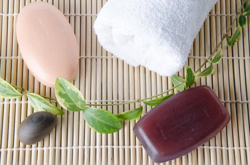 Two soaps and a towel stock image. Image of healthcare - 40096097