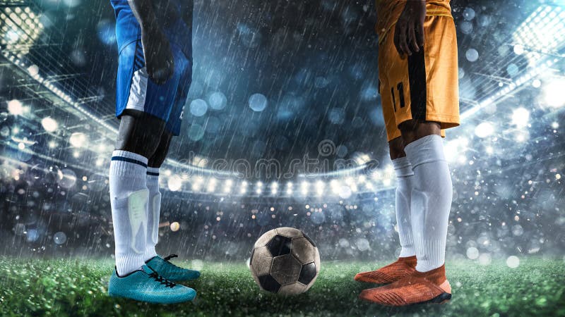 Two Soccer Players Challenge Each Other at the Stadium Stock Image ...