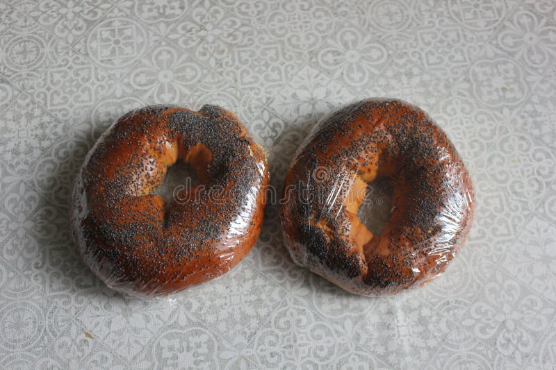 Two soft ring-shaped rolls stock photo. Image of rolls - 313567646