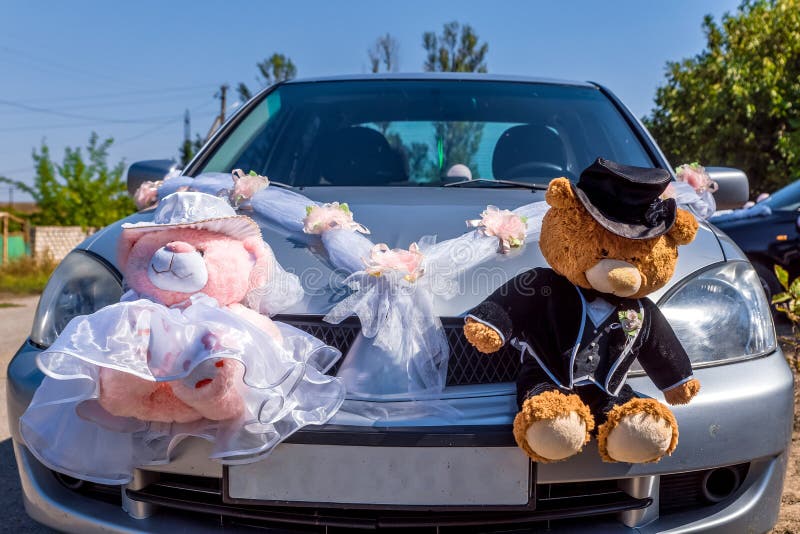 Two Soft Teddy Bear on the Hood of Car. Stock Image - Image of animal ...