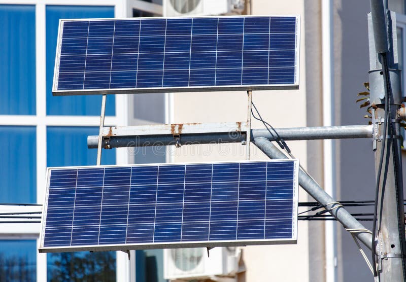 Two Solar Panels are Attached To a Pole Stock Image - Image of cell ...