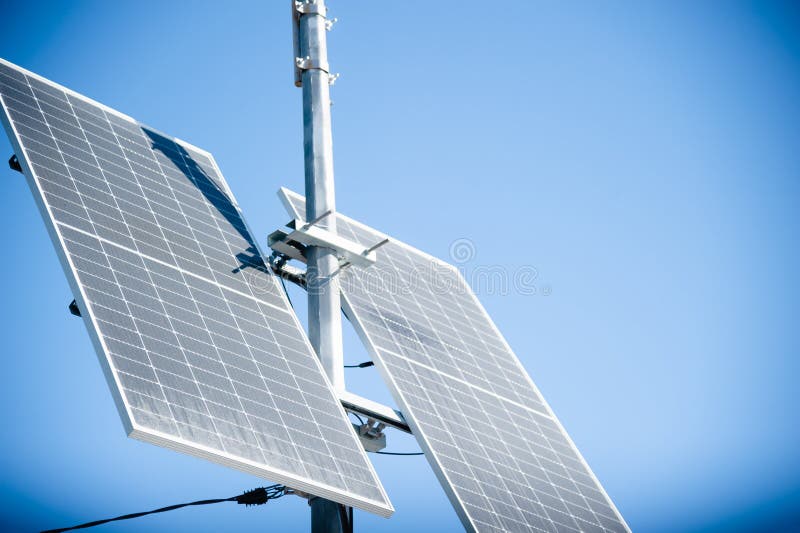 Two Solar Panels on a Pole for Street Lighting at Night Stock Image ...