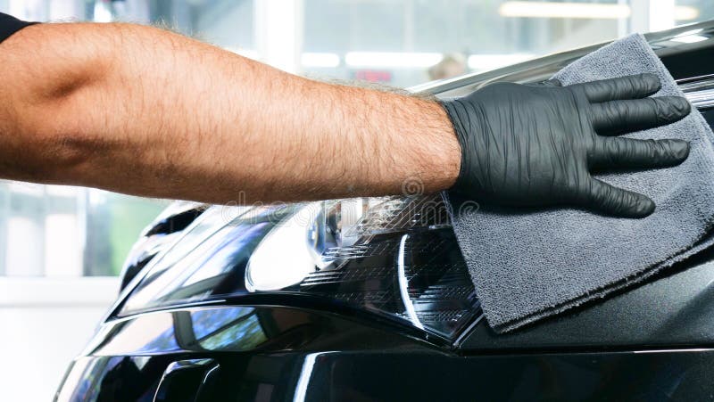 Two Specialist Dries the Car from Moisture, Car Washing. Concept ... Two Specialist Dries the Car from Moisture, Car Washing. Concept ...