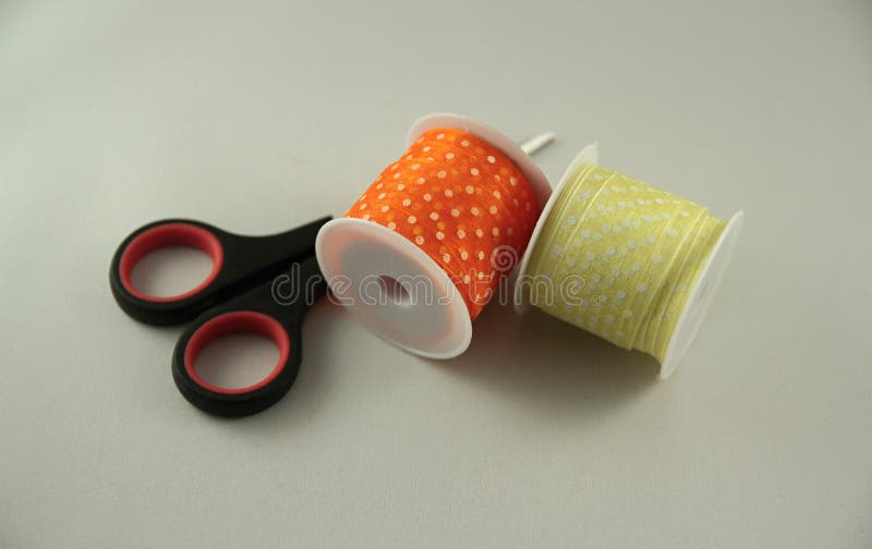 Two spools with scissors stock photo. Image of product - 45994550