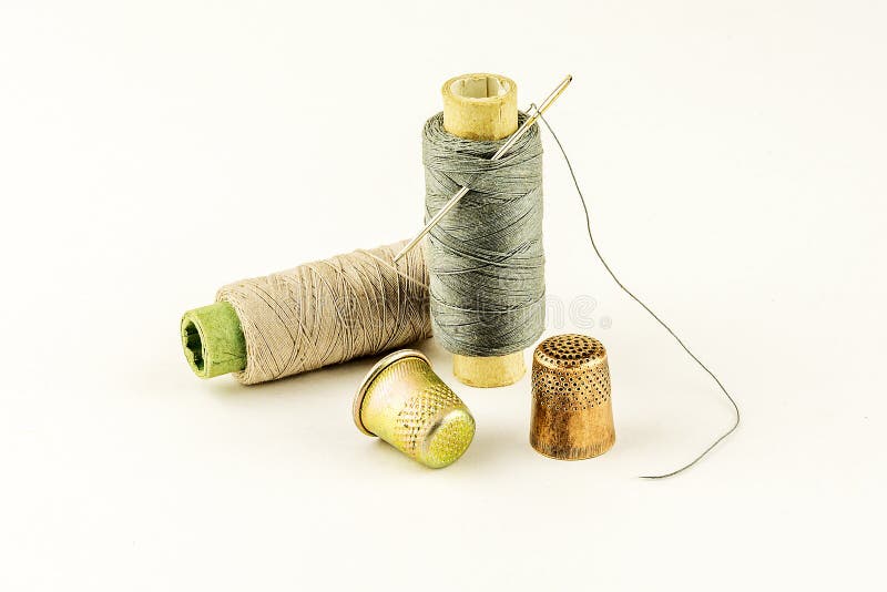 Two Spools of Thread with a Needle and a Thimble for Sewing Two Stock ...