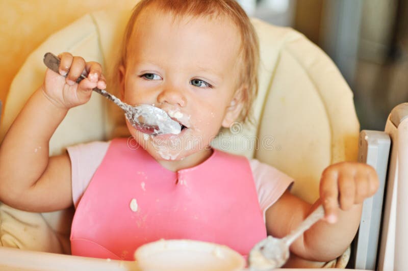With two spoons stock image. Image of face, innocence - 35717341