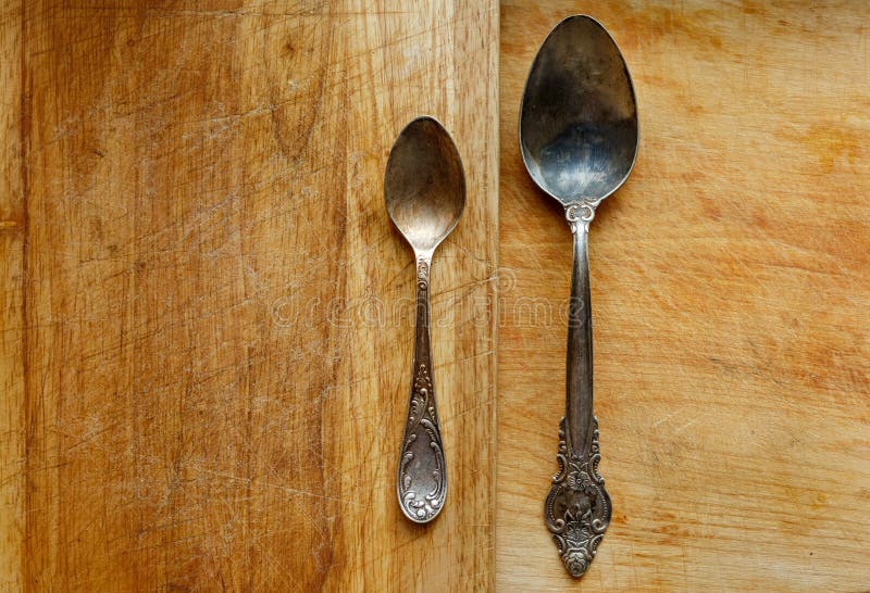 Two Spoons on a Cutting Board Stock Photo - Image of kitchen, dinner ...