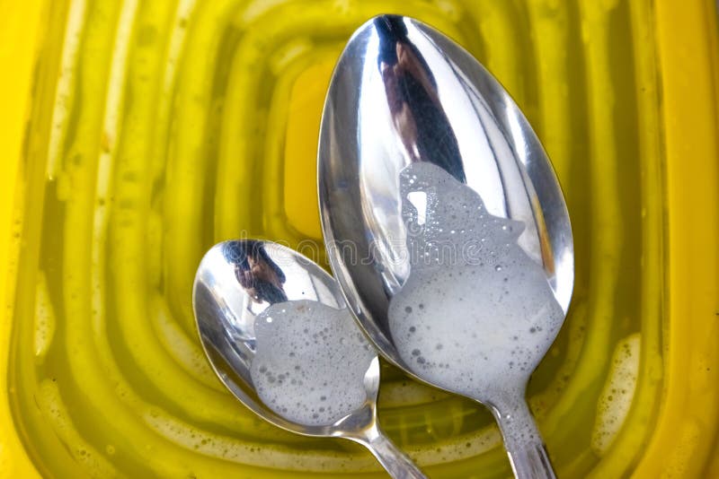 Two Spoons in the Phase of Washing Stock Photo - Image of bath, natural ...