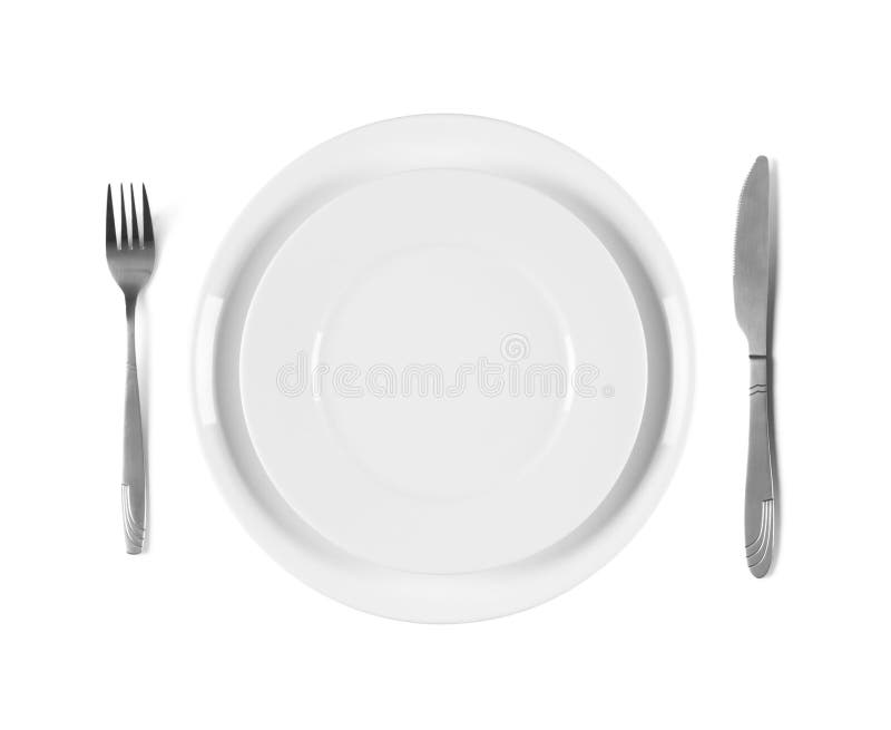 Two Stacked White Plates with Fork and Knife, Isolated on White ...