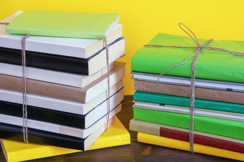 Two Stacks of Different Books Tied with Rope Stock Image - Image of ...