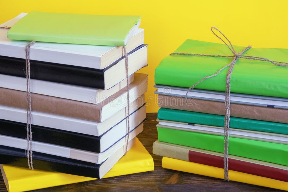 Two Stacks of Different Books Tied with Rope Stock Image - Image of ...