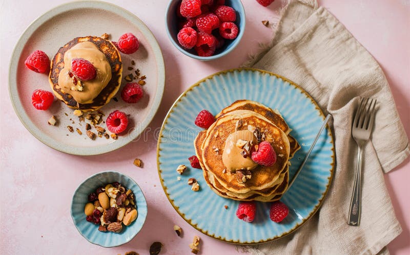 Two Stacks of Pancakes Topped with Peanut Butter, Raspberries, and ...
