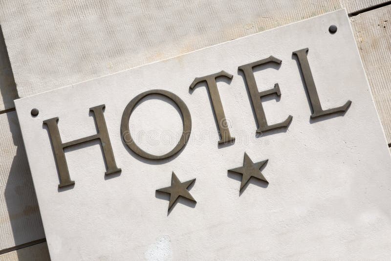 Two Star Hotel Sign stock photo. Image of lodging, slant - 35914860