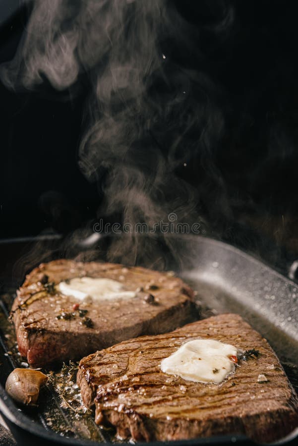 Two Steaks are Fried in a Pan. Do-it-yourself Dinner Concept for Two ...