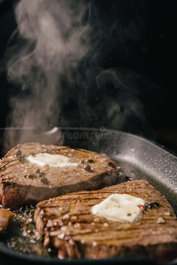 Two Steaks are Fried in a Pan. Do-it-yourself Dinner Concept for Two ...