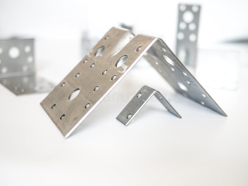 Two Steel Perforated Angle Fasteners Stock Image - Image of perforated ...