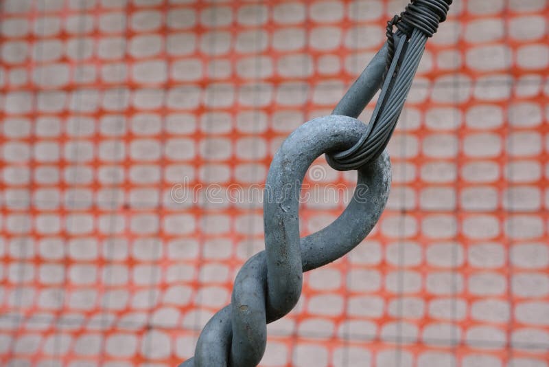 Two Steel Tie Rods, Hooked Together with an Orange Safety Net Stock ...