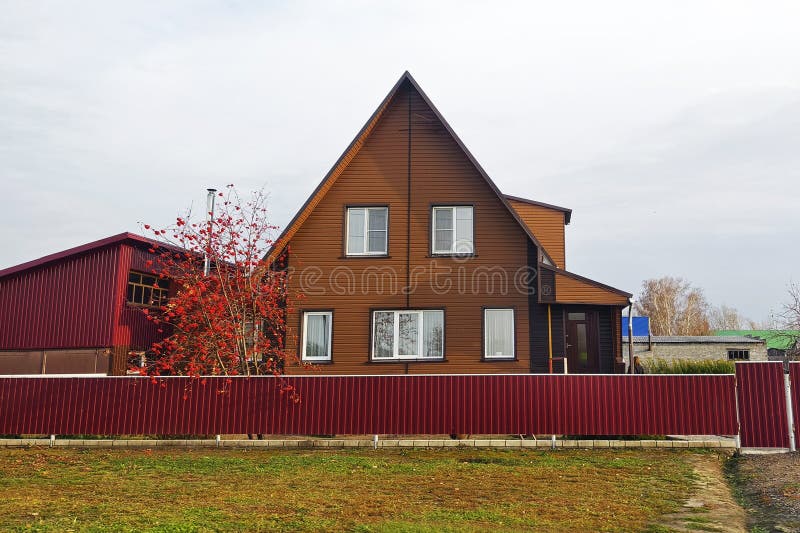 A Two-storied House in a Remote Russian Village. Typical Village House ...