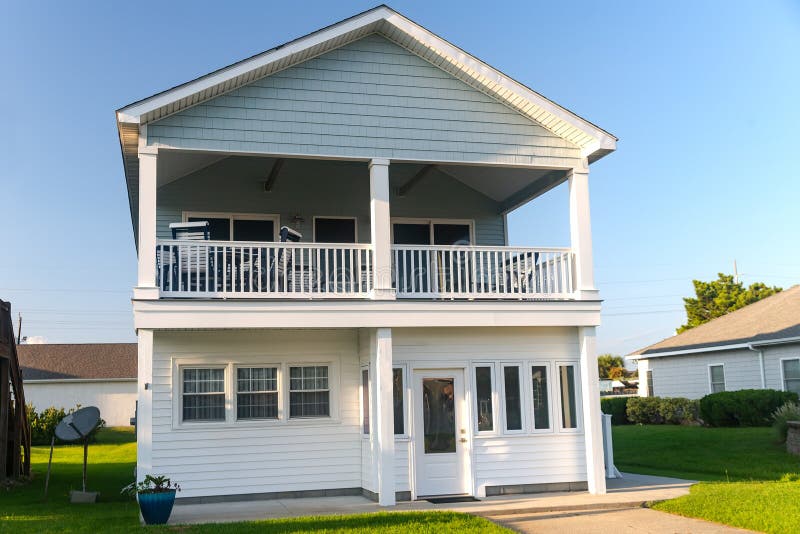 Two-story Cottage by the Atlantic Ocean. Palm Trees and Blue Sky ...