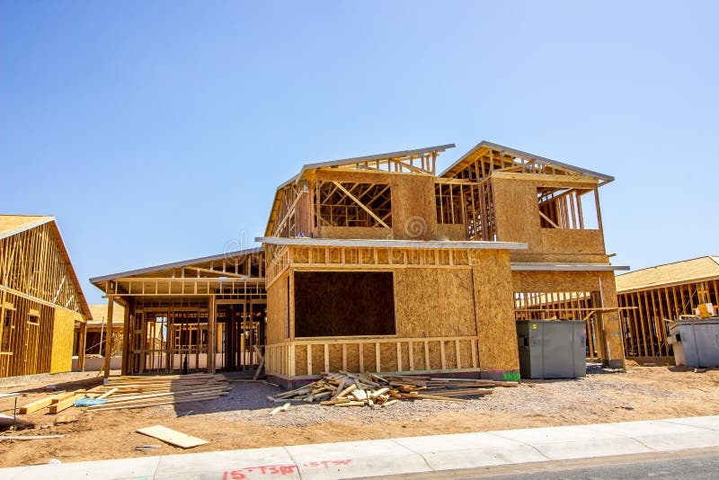 Two Story Home in Framing Stage of Construction Stock Photo - Image of ...
