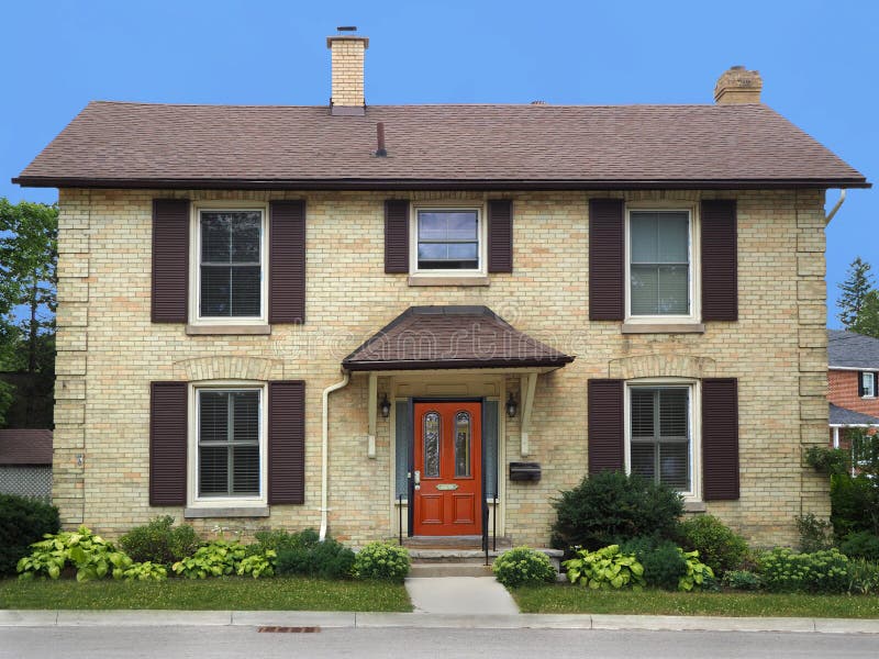 Two Story Yellow Brick House Stock Image - Image of detached, yard ...