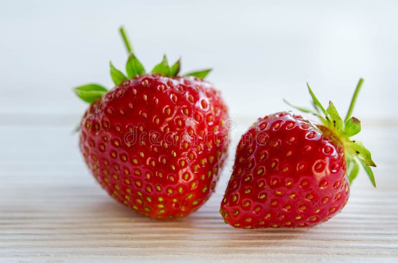 Two Strawberries on Wooden Table Stock Photo - Image of path, shot ...