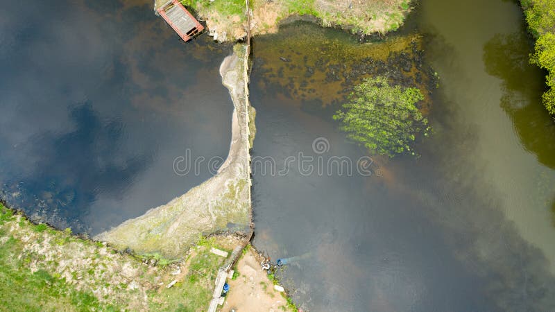 Two Streams of the River are Joined Together by Dirty and Clean Water ...
