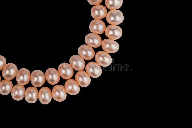 Two Strings of Natural Pink Pearls, Isolate on a Black Background Stock ...
