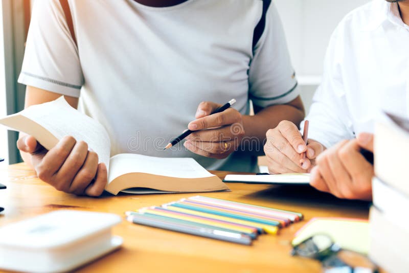 Two Student Doing Homework in University Stock Photo - Image of ...