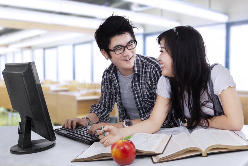 Two Student Laughing in Class Stock Photo - Image of korean, keyboard ...