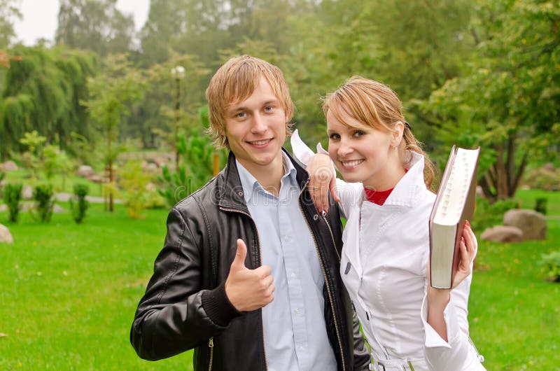 Two students stock image. Image of green, male, outside - 26516879