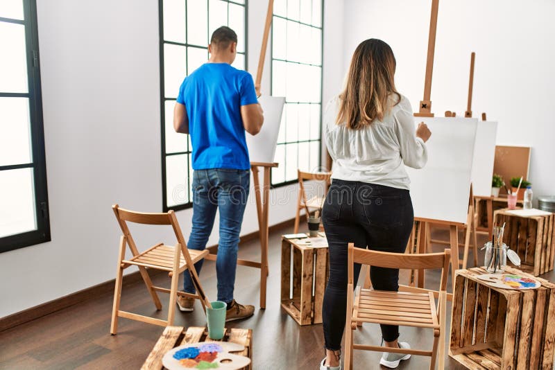 Two Students on Back View Painting at Art School Stock Image - Image of ...