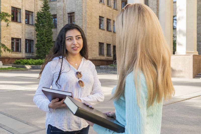 Conversation of Two Women at the University Stock Photo - Image of ...