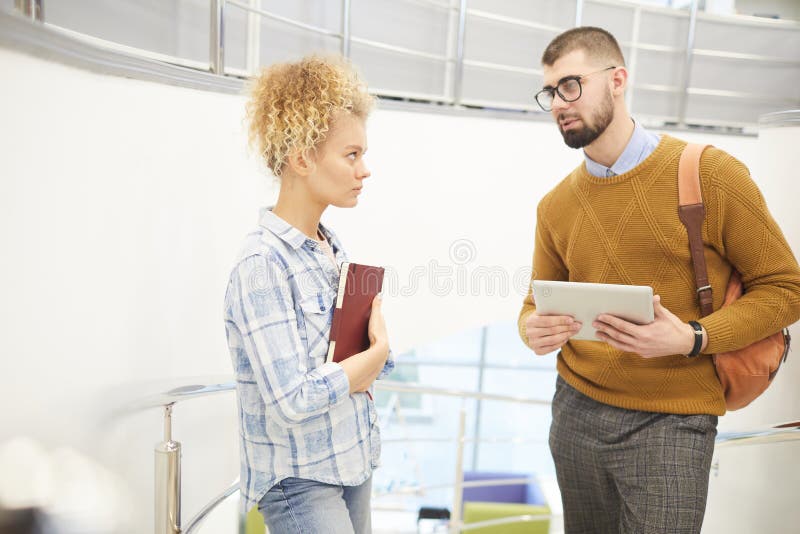 Two Students Chatting in College Stock Image - Image of businessman ...