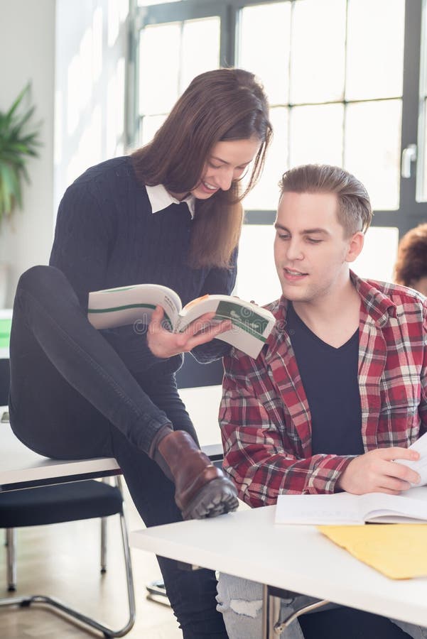 Two Students Checking Information and Knowledge while Learning Together ...