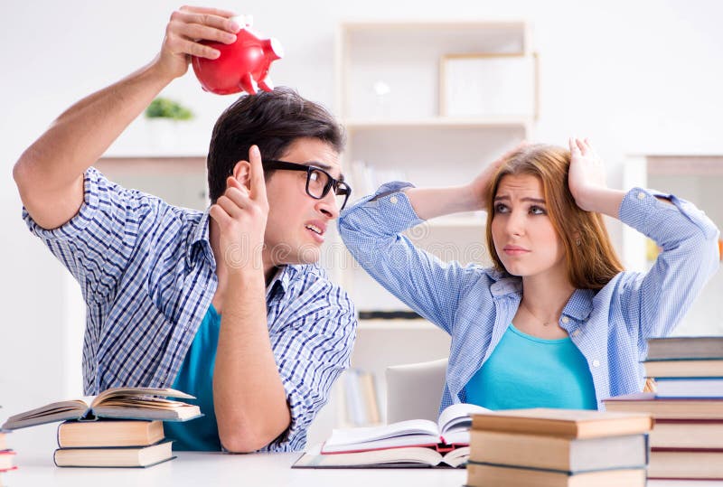 Two Students Checking Savings To Pay for Education Stock Image - Image ...