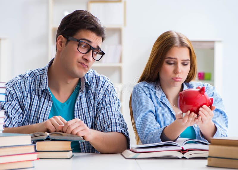 Two Students Checking Savings To Pay for Education Stock Image - Image ...